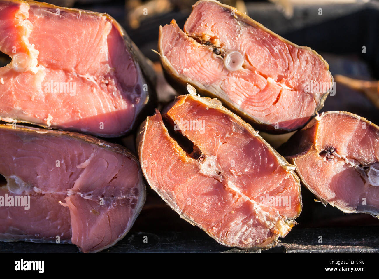 A row of fresh salmon chunks and steaks at a local fish market Stock ...