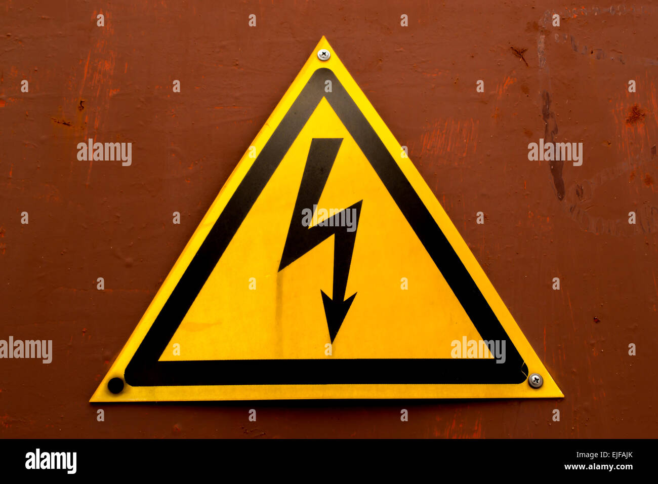 Electric Shock Symbol in bright yellow on an orange background Stock ...