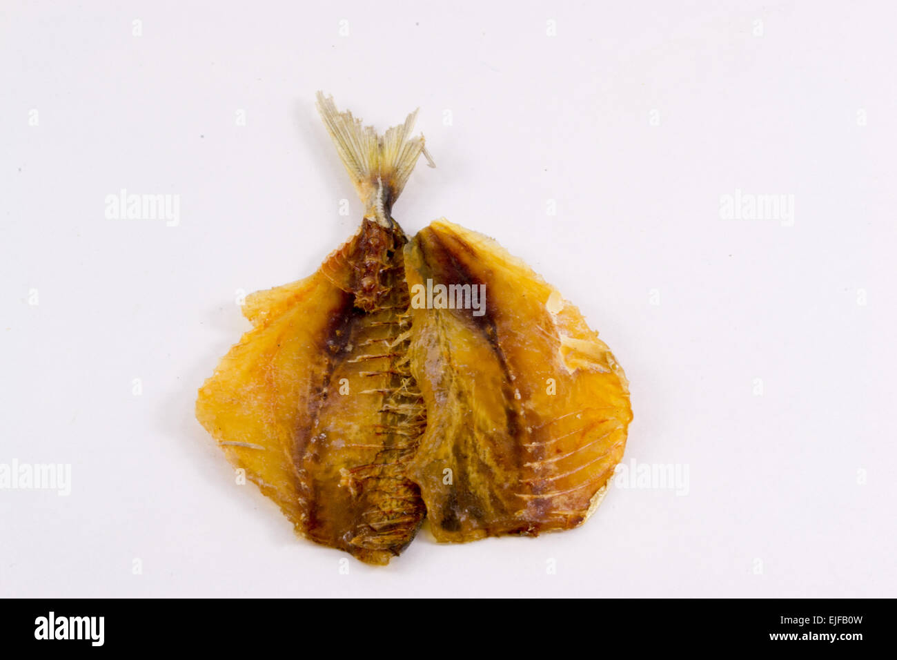 Traditional Russian beer snack of dried salted fish isolated on white ...