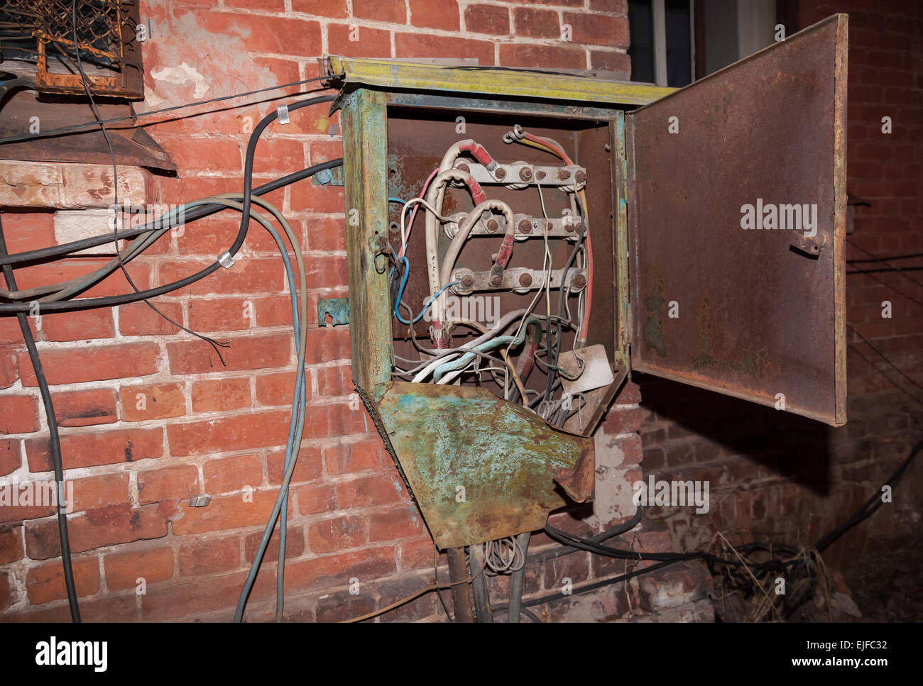 Old electricity distribution with a lot of cables Stock Photo - Alamy