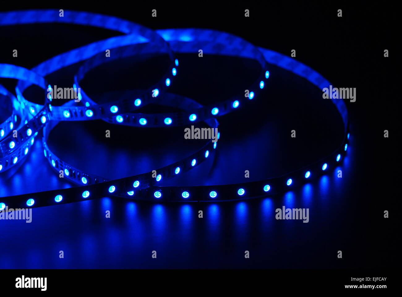 Led stripe on the black background Stock Photo - Alamy