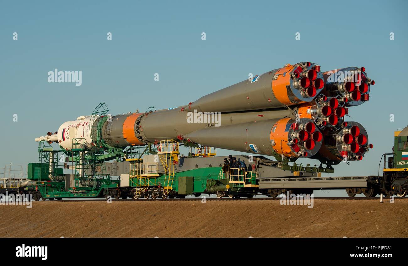 The Soyuz TMA-16M spacecraft is rolled out by train to the launch pad ...