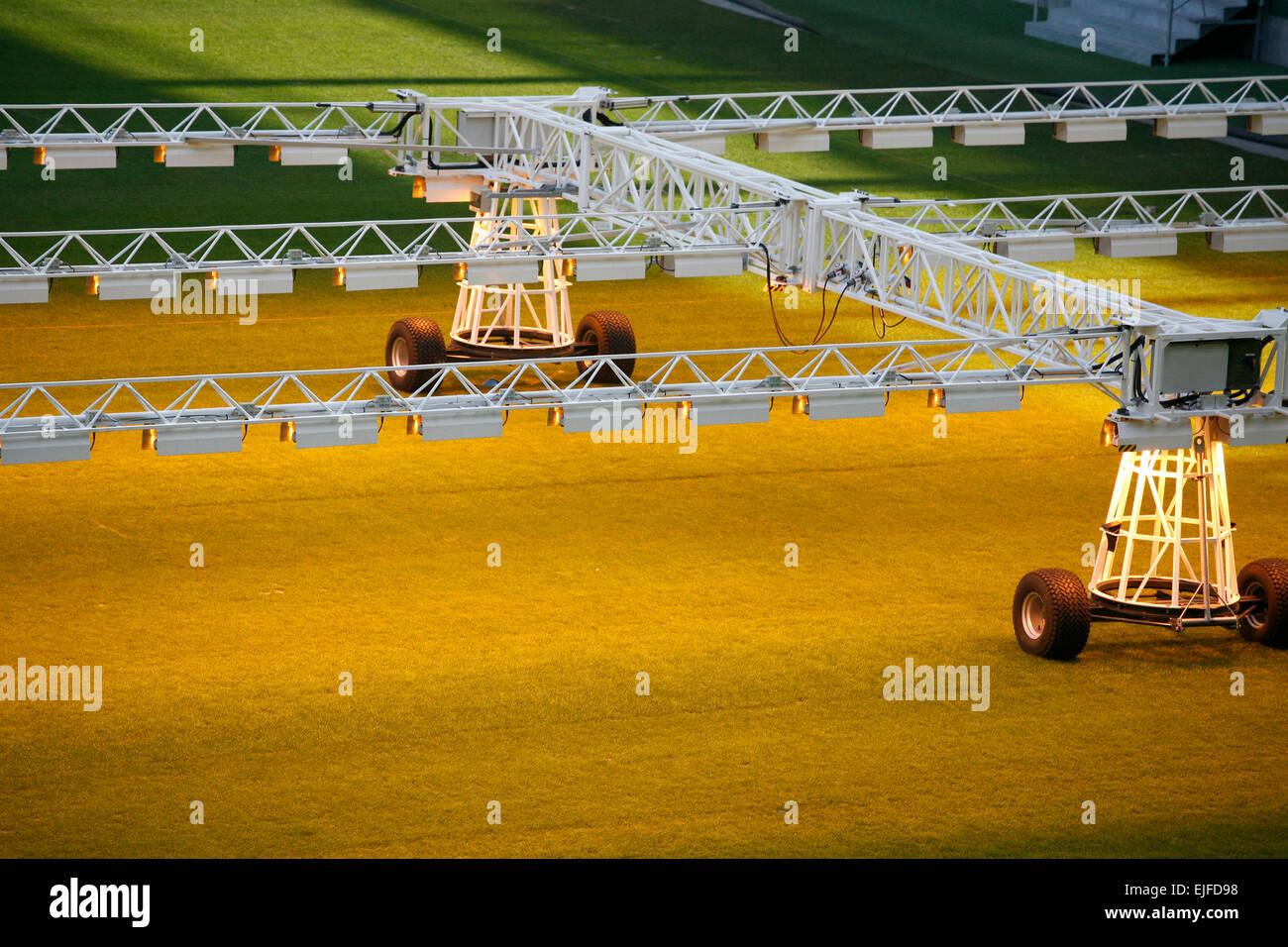 Mobile lighting rig system for growing grass and lawn in empty a ...