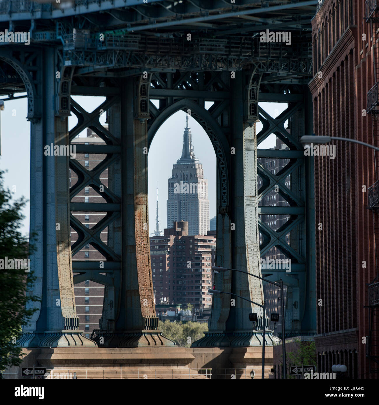 View of the Empire State Building through Manhattan Bridge, Manhattan ...