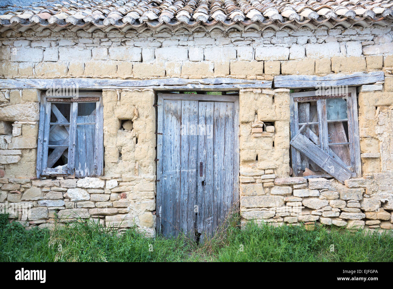 Shabby house in ancient village of Peroulades in Northern Corfu ...