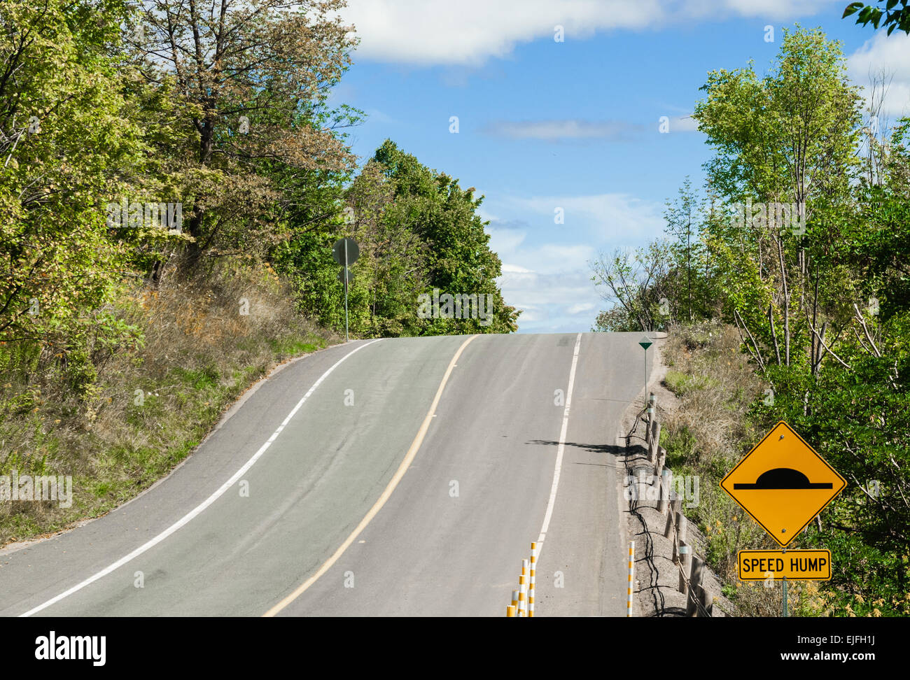 Speed bump on road hi-res stock photography and images - Alamy