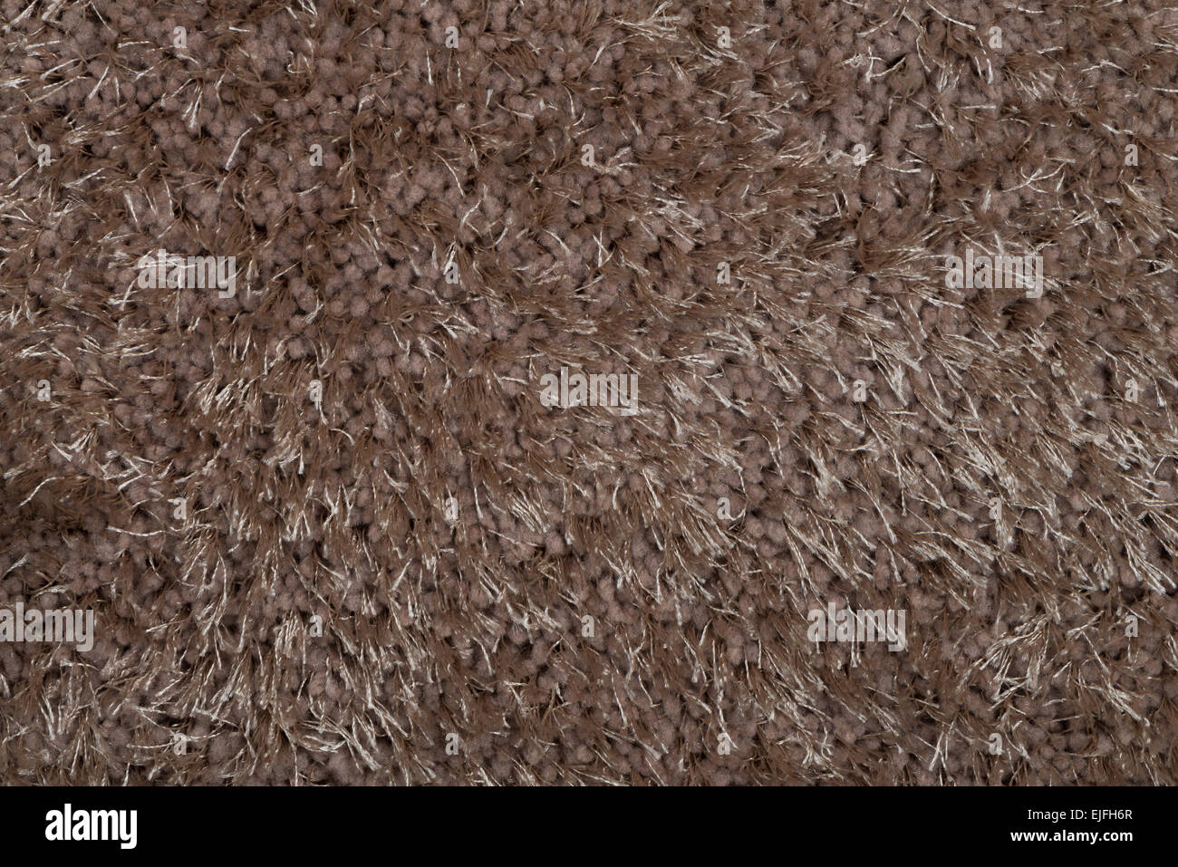Closeup detail of brown carpet texture background Stock Photo - Alamy