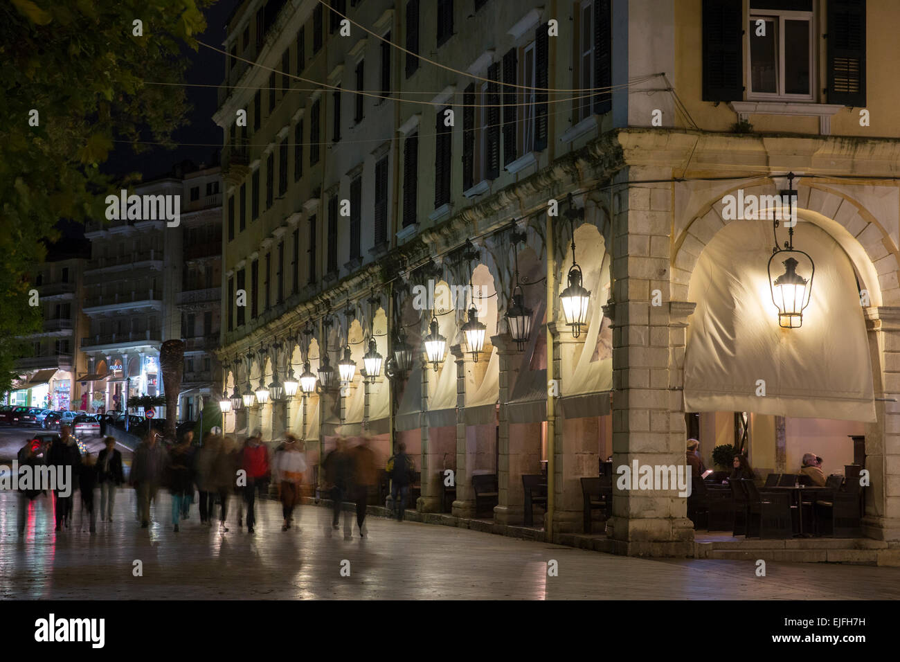 People strolling at night by the Spianada in Kerkyra, Corfu Town ...