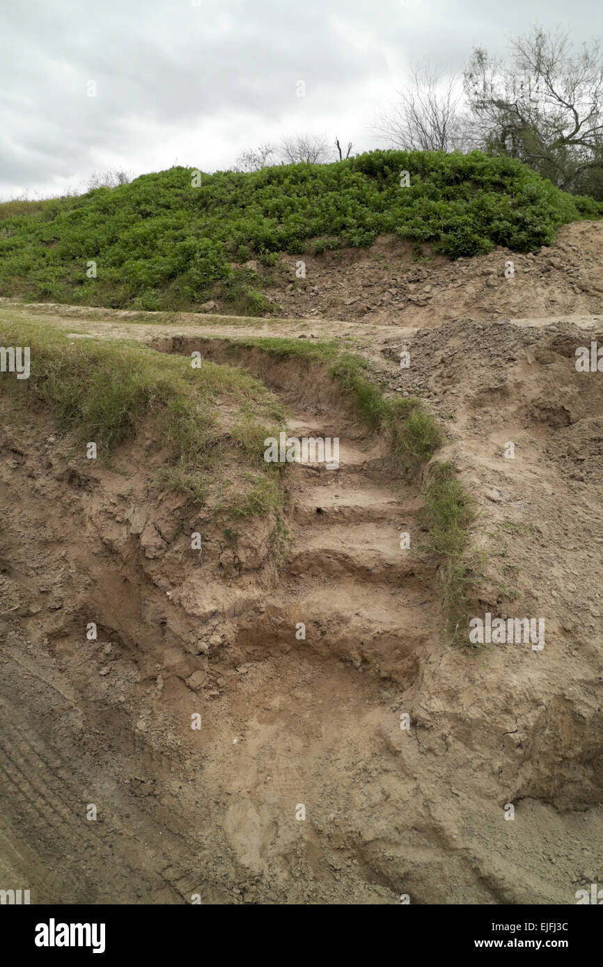 Earthen steps carved into the caliche river bank leading to the ferry ...