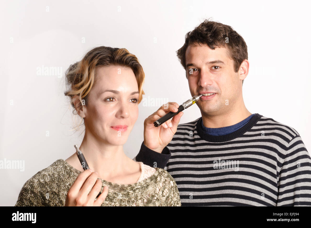 a young couple smoking Stock Photo - Alamy