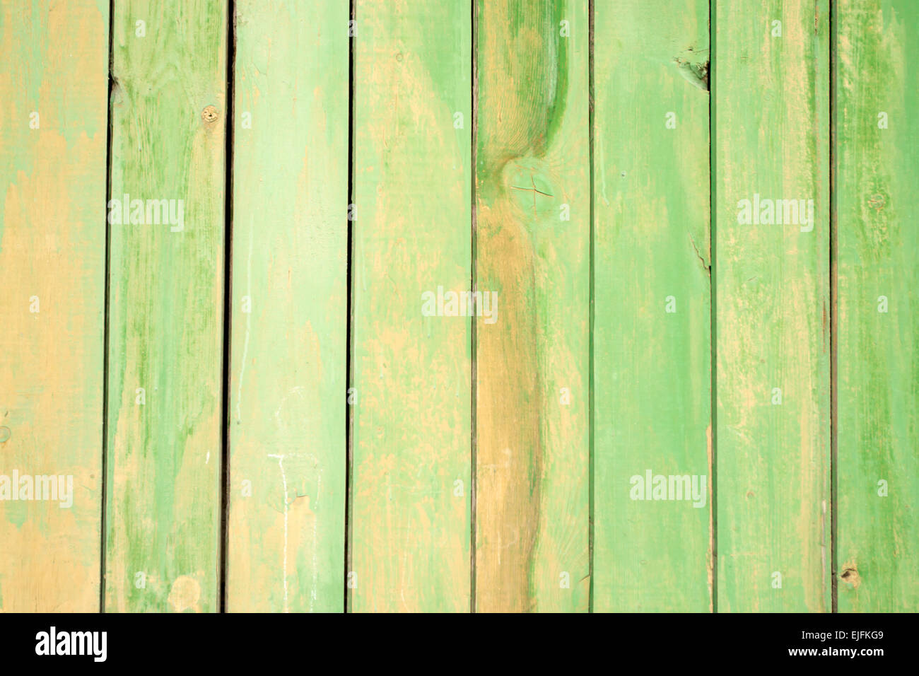 Green painted wooden slats and planks fading with the years Stock Photo ...