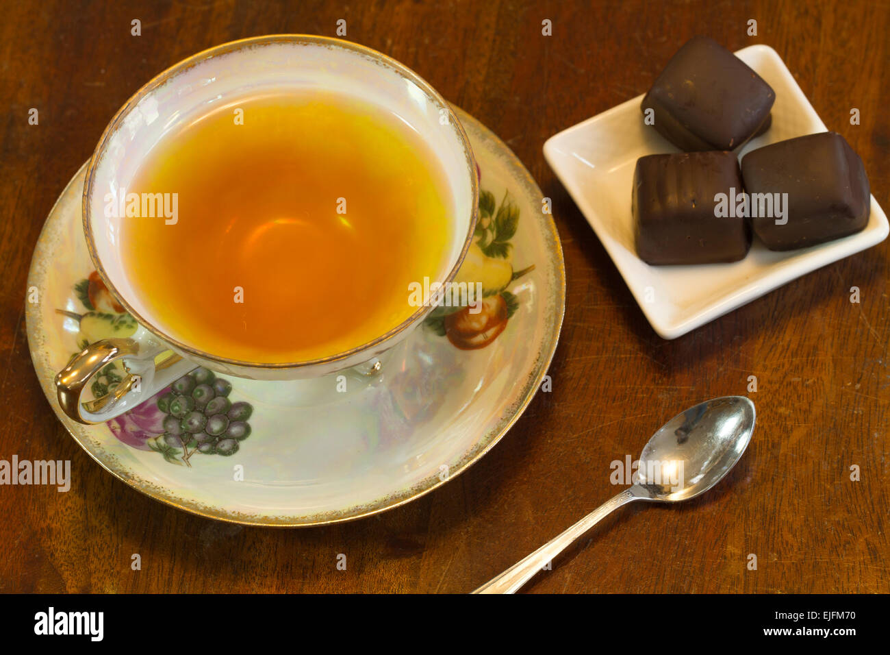 Tea served with chocolate truffles and aroma therapy Stock Photo - Alamy