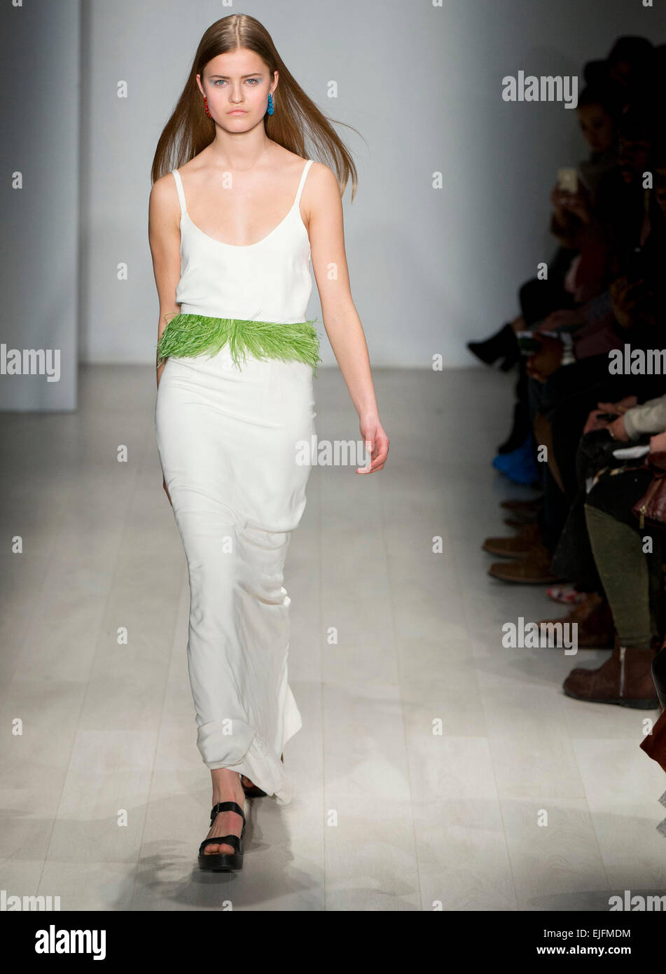 Toronto, Canada. 25th Mar, 2015. A model presents a creation of Malorie ...