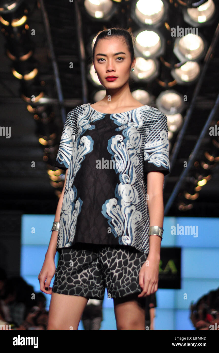 Jakarta, Indonesia. 25th March, 2015. A model walks the runway at the ...
