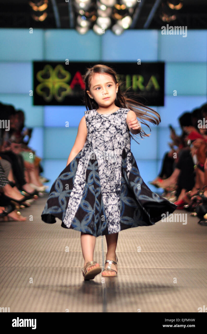 Jakarta, Indonesia. 25th March, 2015. A model walks the runway at the ...