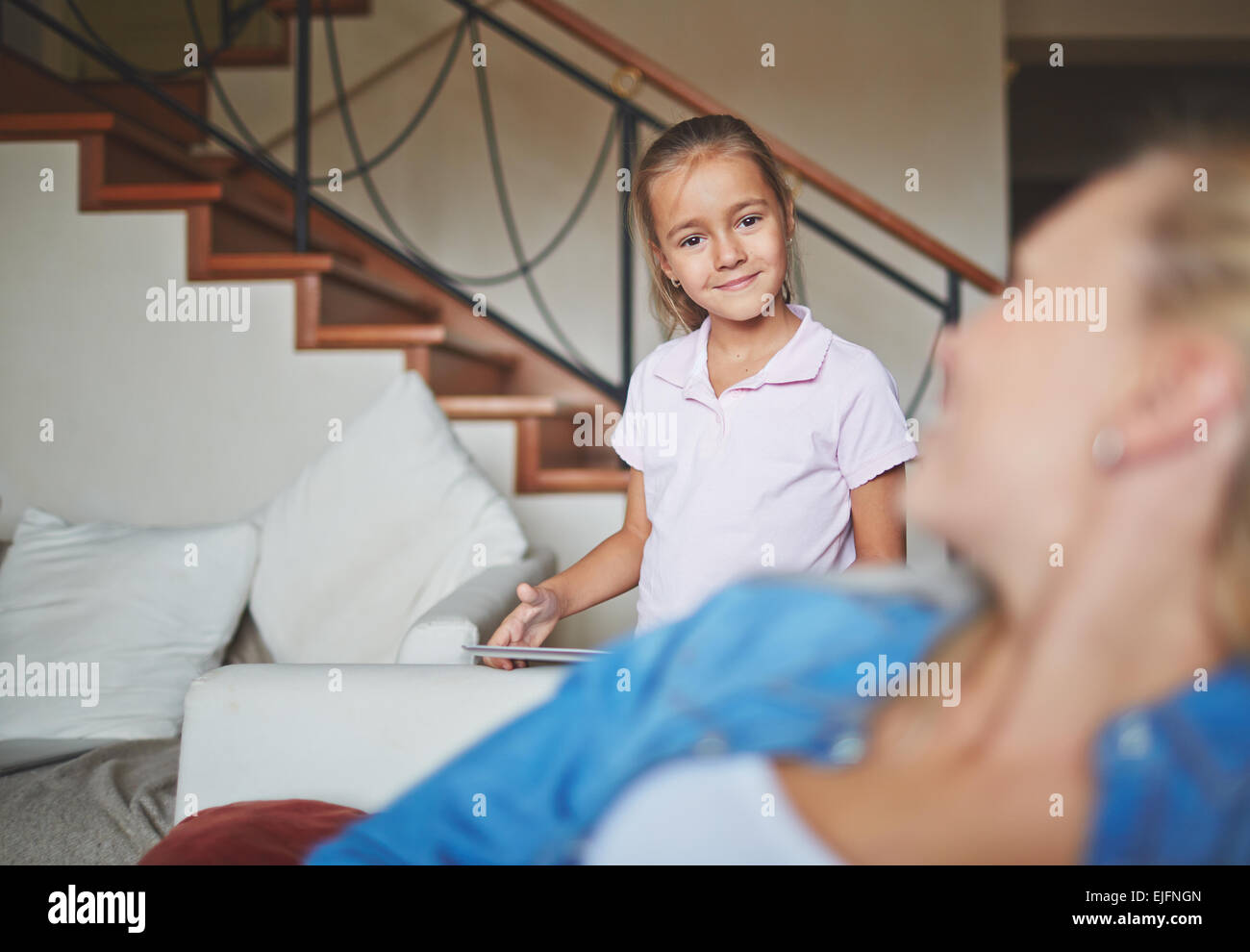 Little girl coming to mother Stock Photo - Alamy