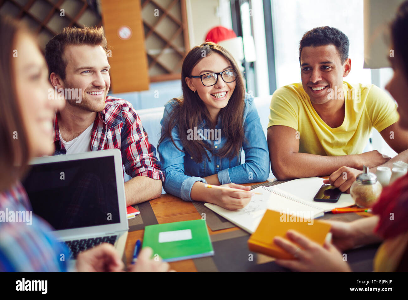 Group of people talking to each other Stock Photo - Alamy