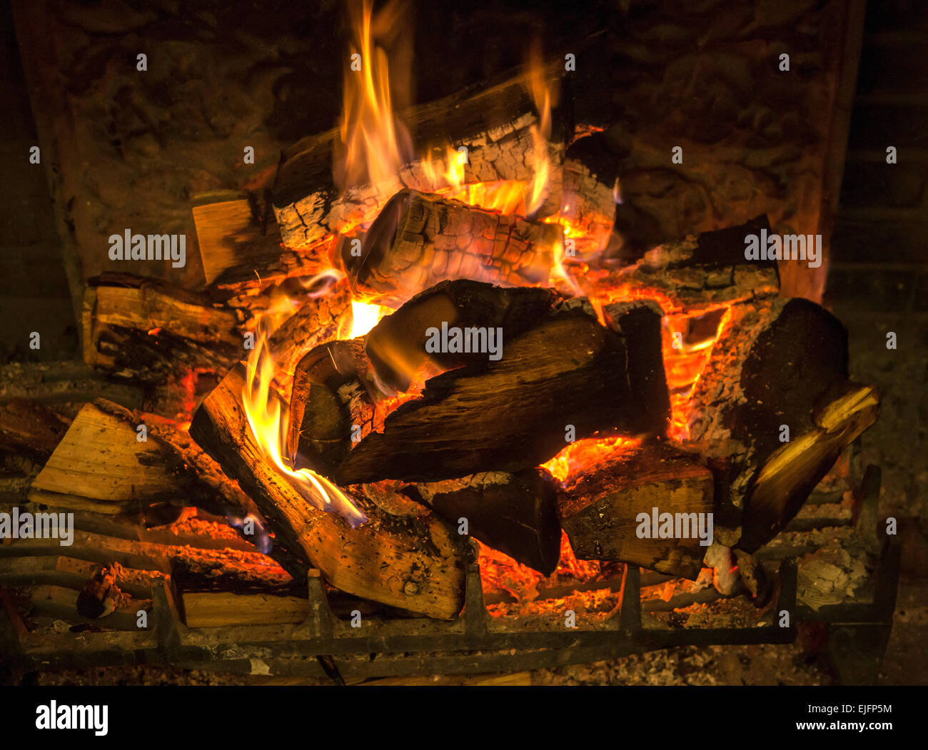 A warming welcoming log fire Stock Photo - Alamy