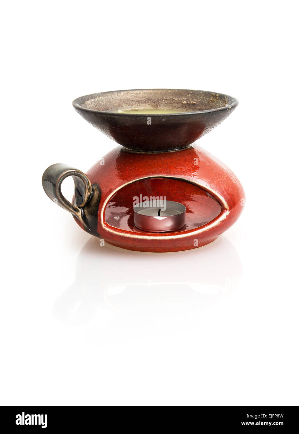 Stylish red ceramic candlestick with reflection on the white background ...