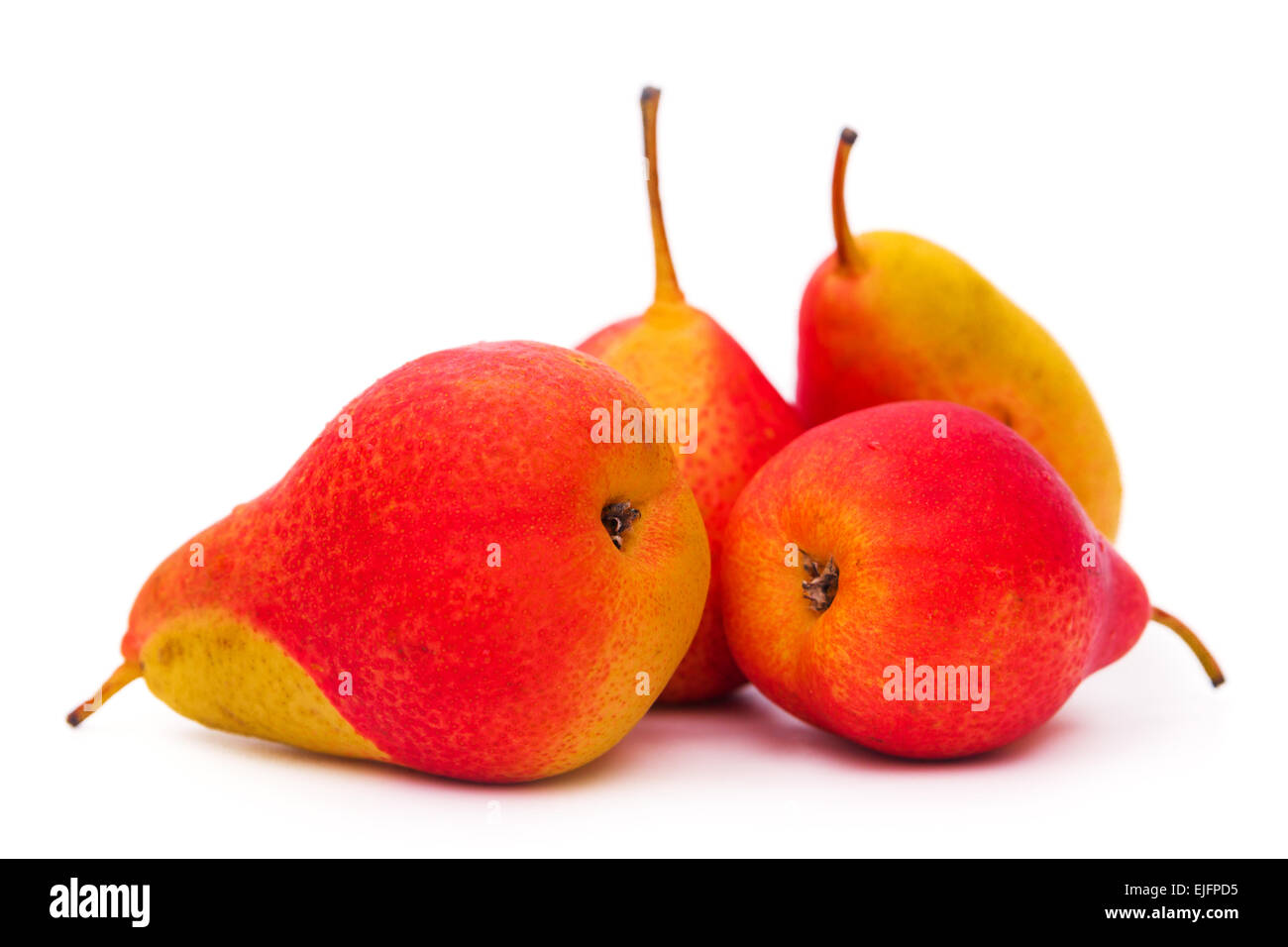 Fresh red pears on a white background Stock Photo - Alamy