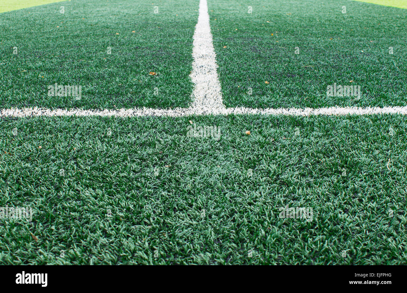 White sideline on green football field. Sideline on green artificial ...