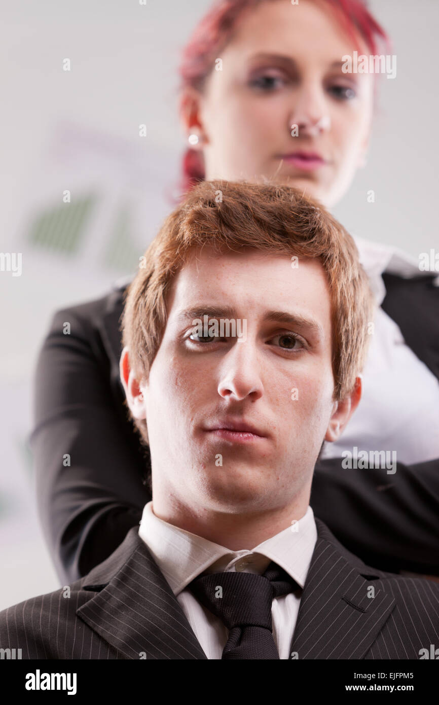 Woman pestering man in office hi-res stock photography and images - Alamy