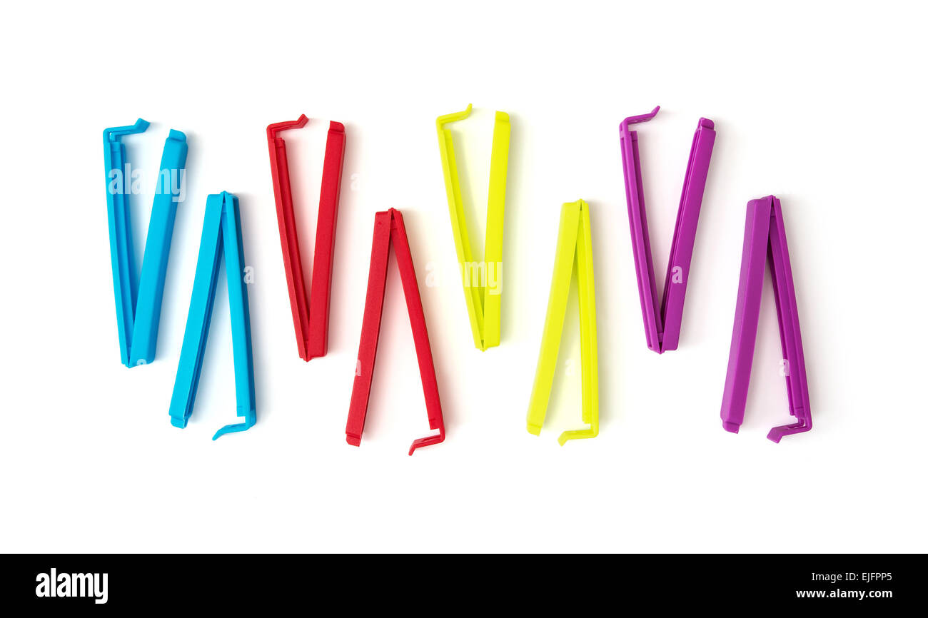 Various colorful bag clips on the white background Stock Photo - Alamy