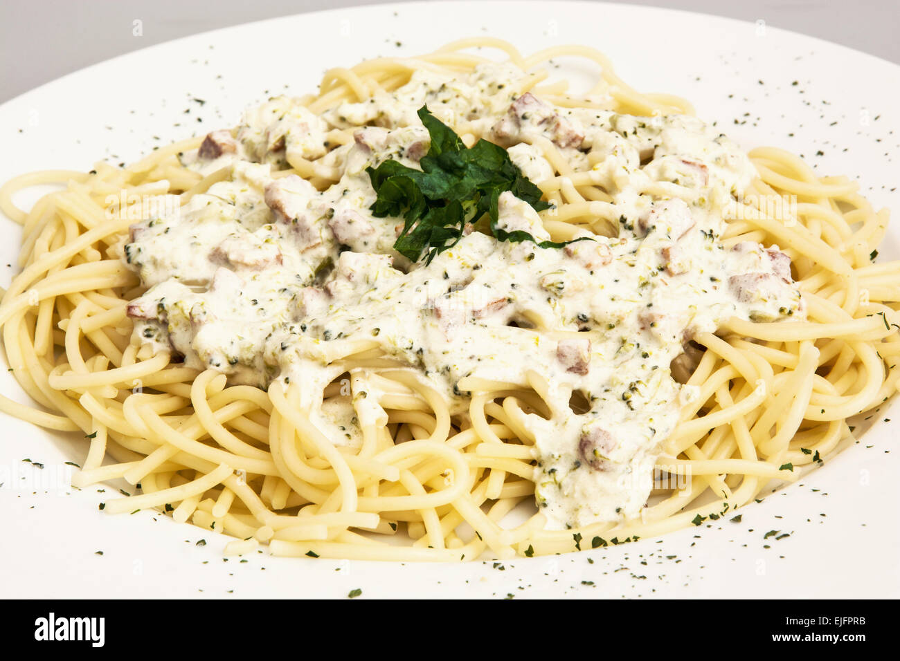 Tasty italian spaghetti on the white plate. Food and drinks Stock Photo ...