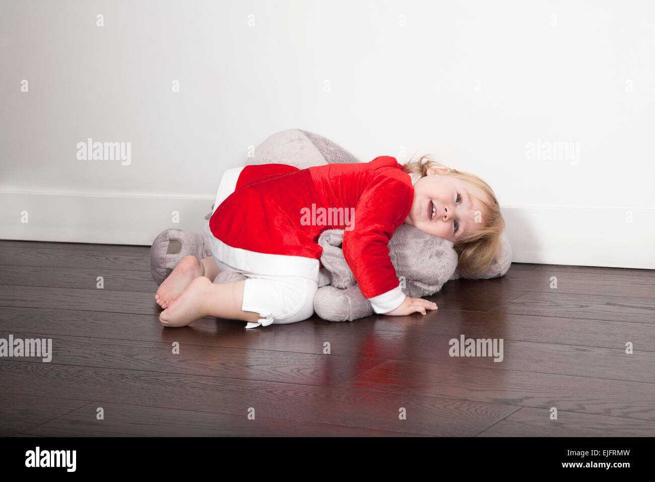 one year age caucasian blonde cute lovely tender baby barefoot Santa ...