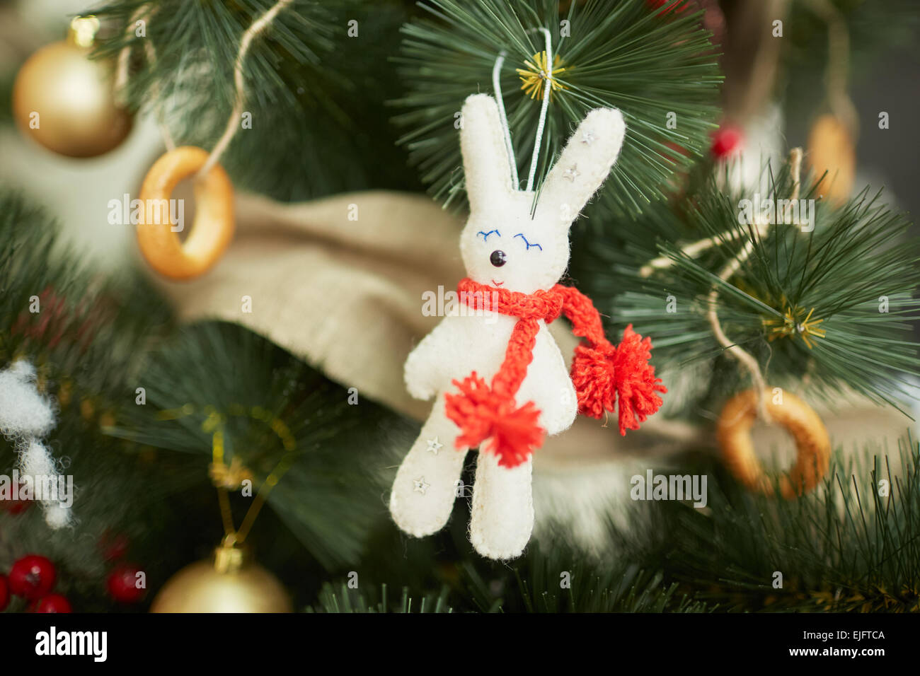 little rabbit hanging on a Christmas tree Stock Photo - Alamy