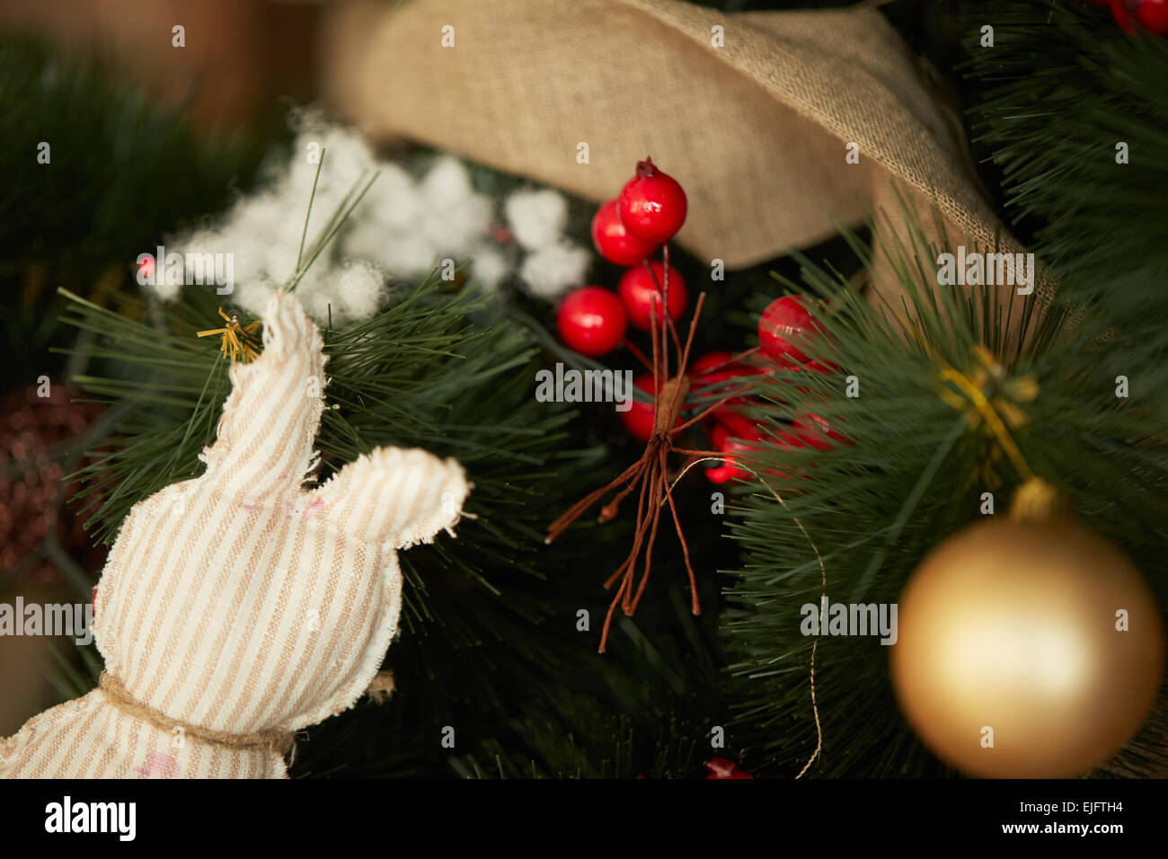 little rabbit hanging on a Christmas tree Stock Photo - Alamy