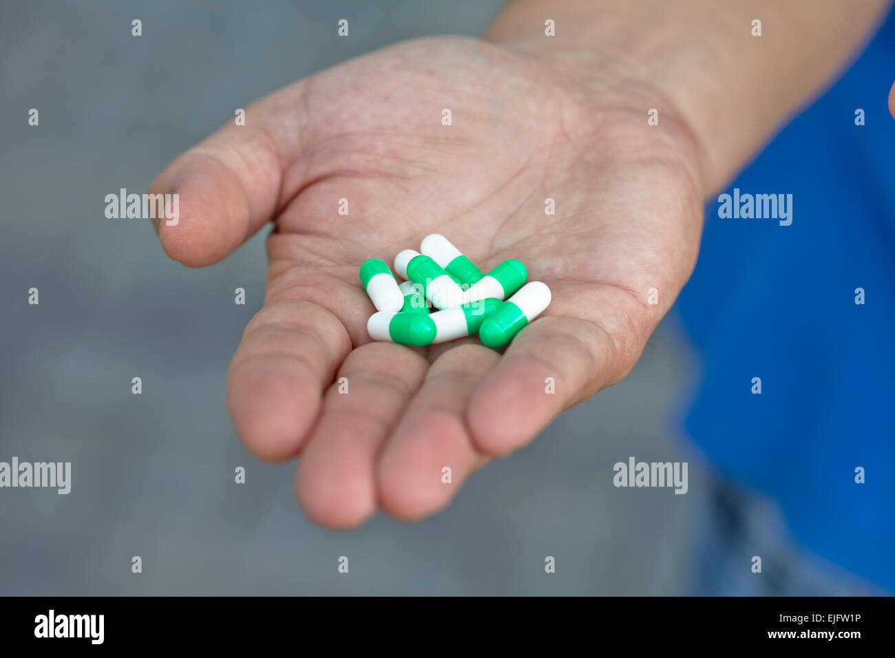 the doctor gave the patient medication capsules Stock Photo - Alamy