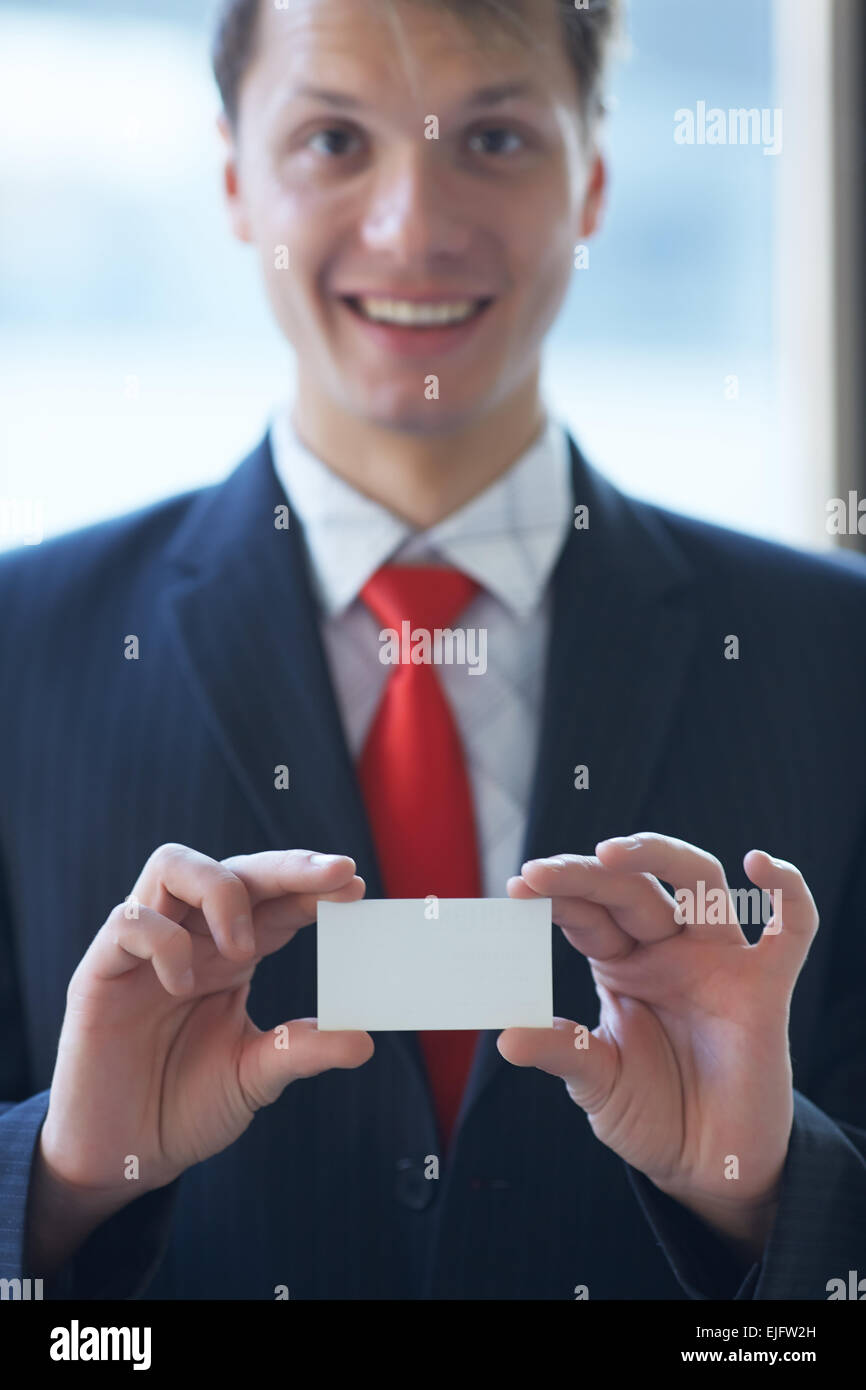 businessman giving a business card Stock Photo - Alamy