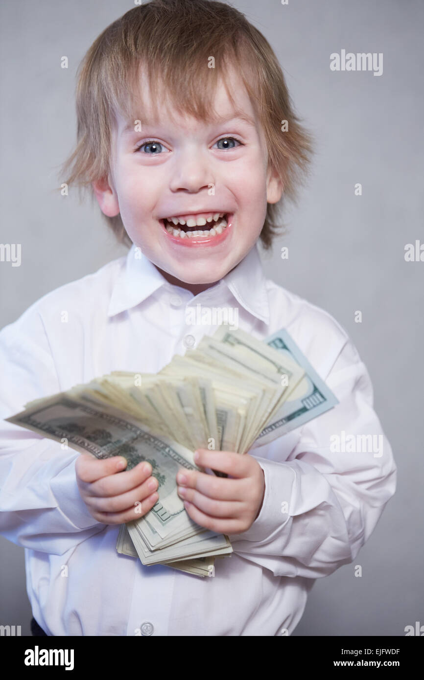 money in children's hands Stock Photo - Alamy