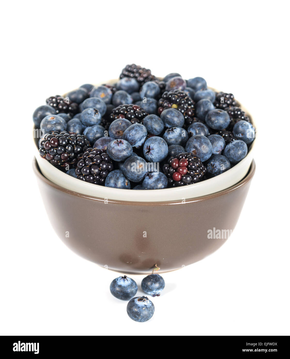Fresh sweet blueberries and blackberries on a white background Stock ...