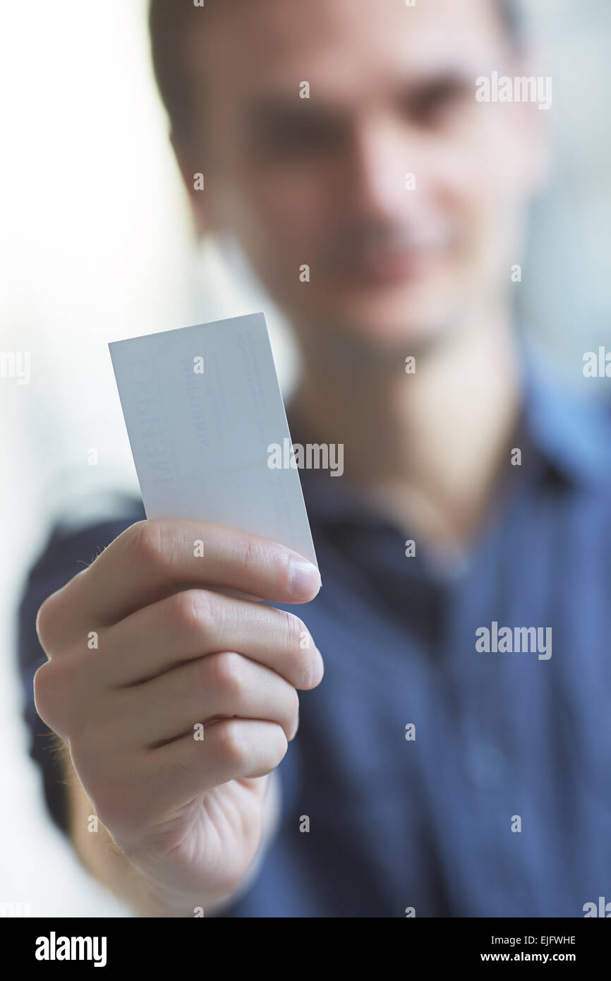 businessman giving a business card Stock Photo - Alamy