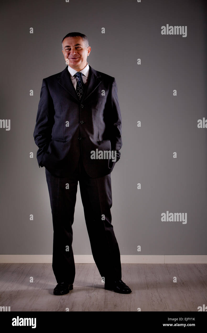 old involved business man thinking and active Stock Photo - Alamy