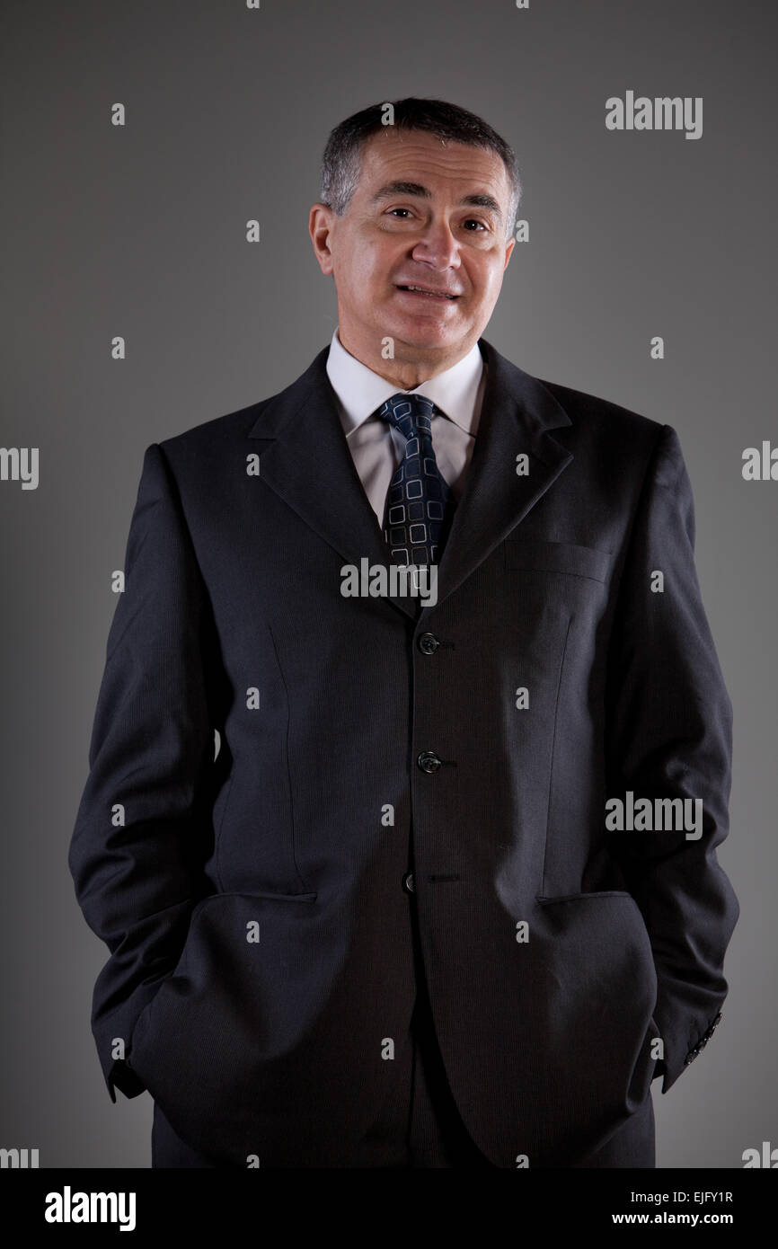 old involved business man thinking and active Stock Photo - Alamy