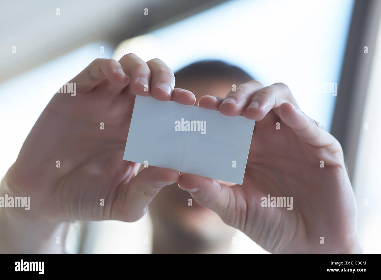 businessman giving a business card Stock Photo - Alamy