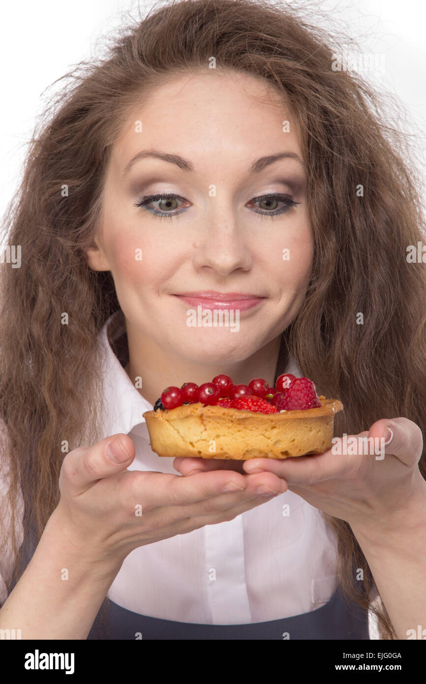 Woman enjoy cake, isolated Stock Photo - Alamy