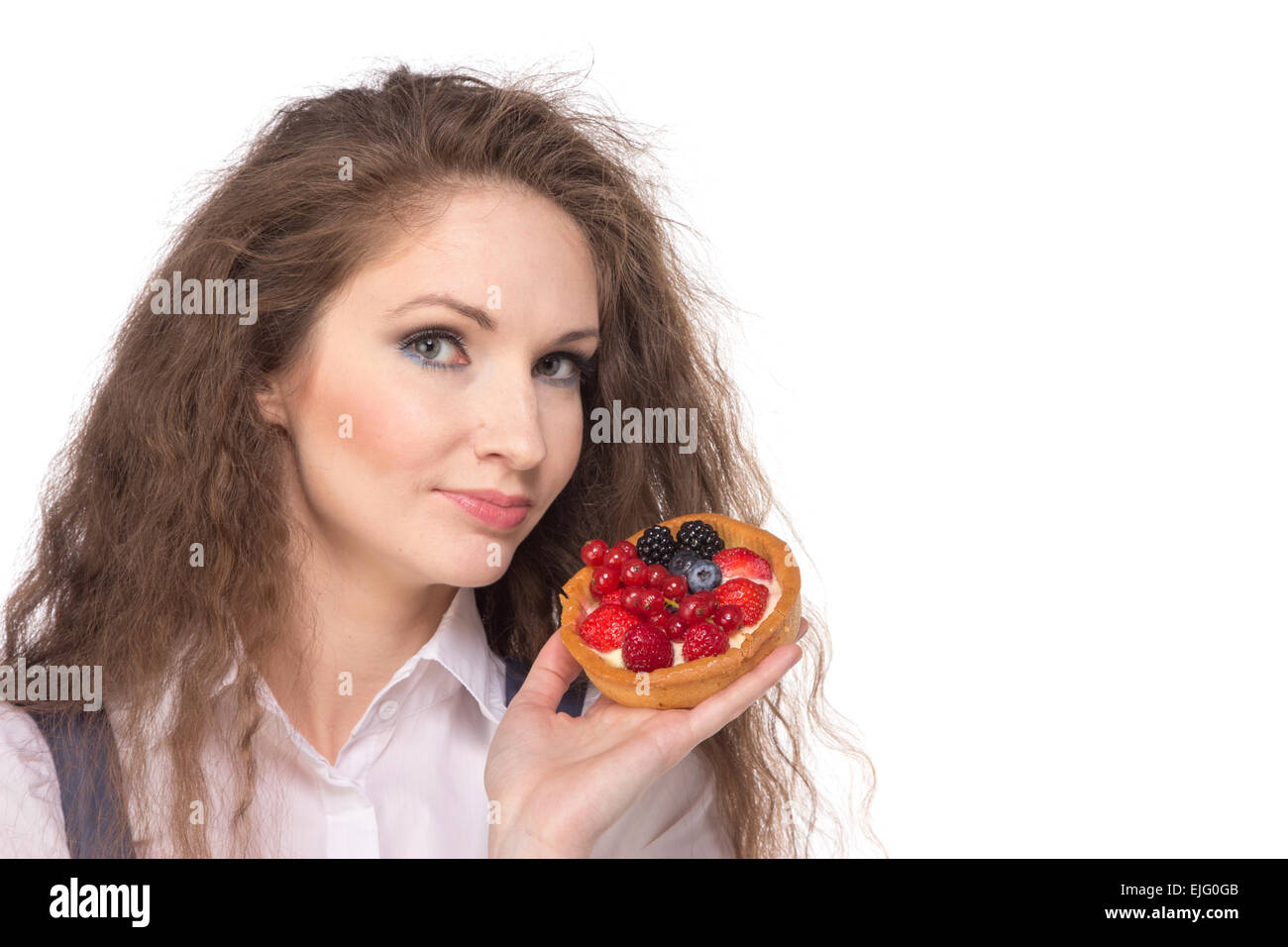 Woman enjoy cake, isolated Stock Photo - Alamy