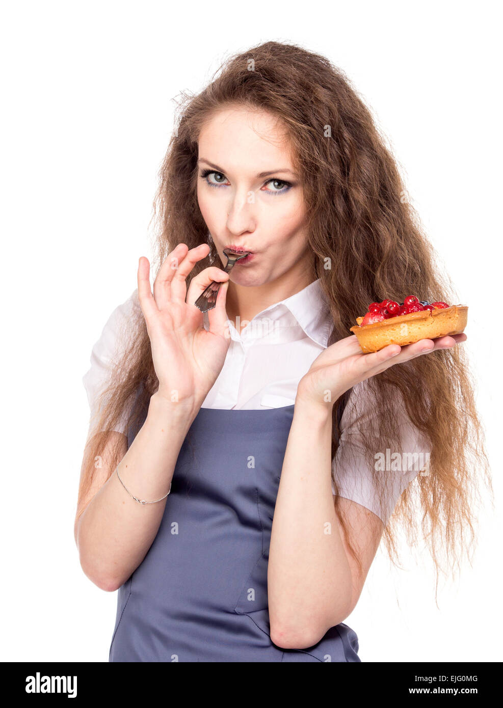 Woman enjoy cake, isolated Stock Photo - Alamy