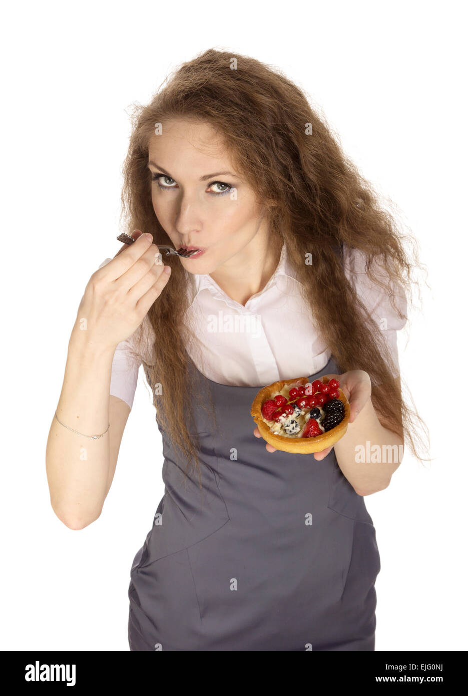 Woman enjoy cake, isolated Stock Photo - Alamy