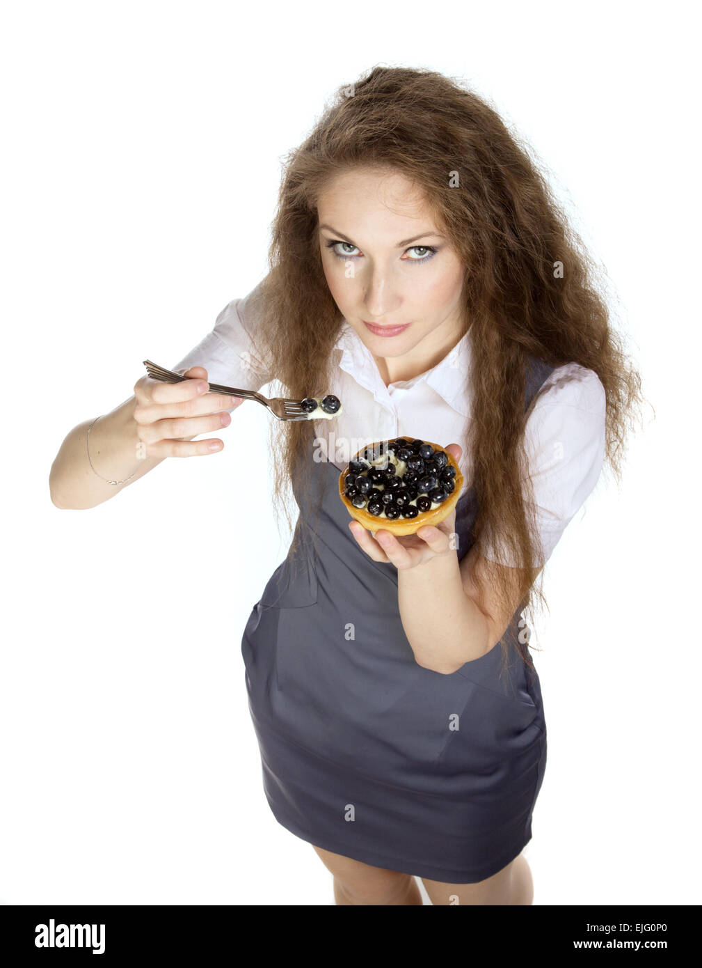 Woman enjoy cake, isolated Stock Photo - Alamy