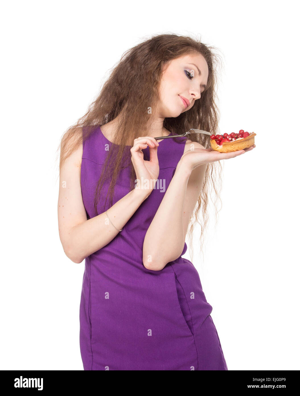 Woman enjoy cake, isolated Stock Photo - Alamy