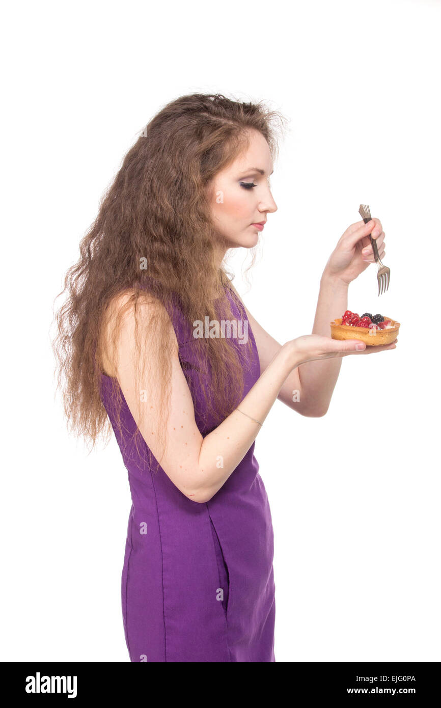 Woman enjoy cake, isolated Stock Photo - Alamy