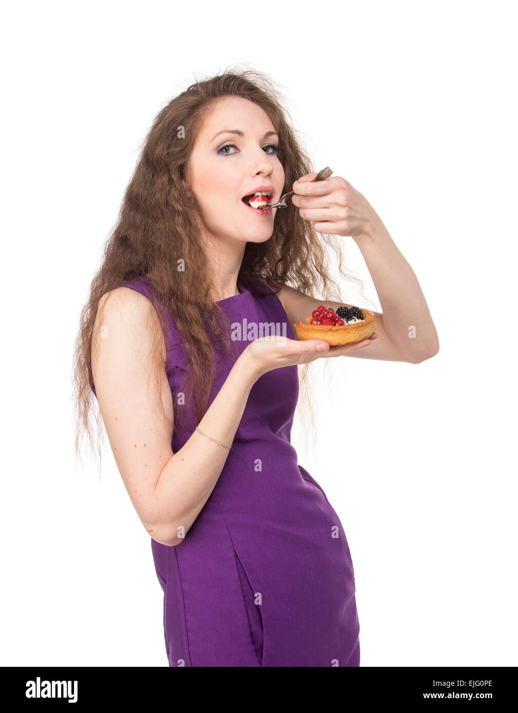 Woman enjoy cake, isolated Stock Photo - Alamy
