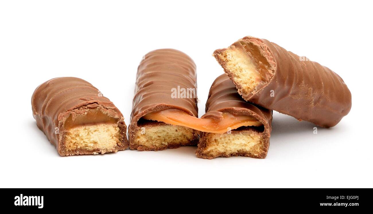 Chocolate bars with caramel and cookie on a white background. Front ...