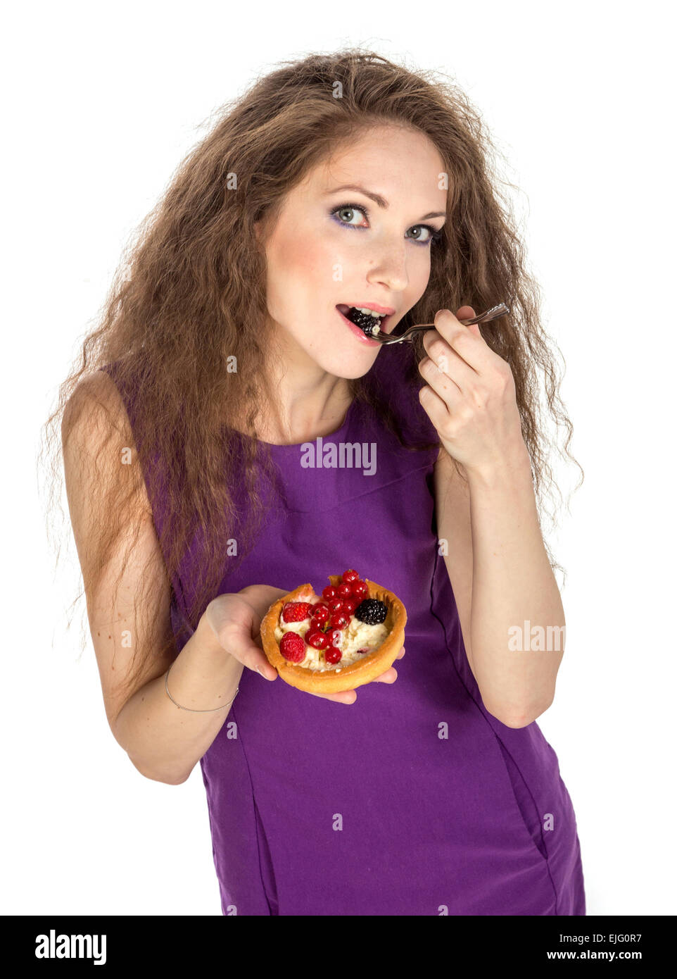 Woman enjoy cake, isolated Stock Photo - Alamy