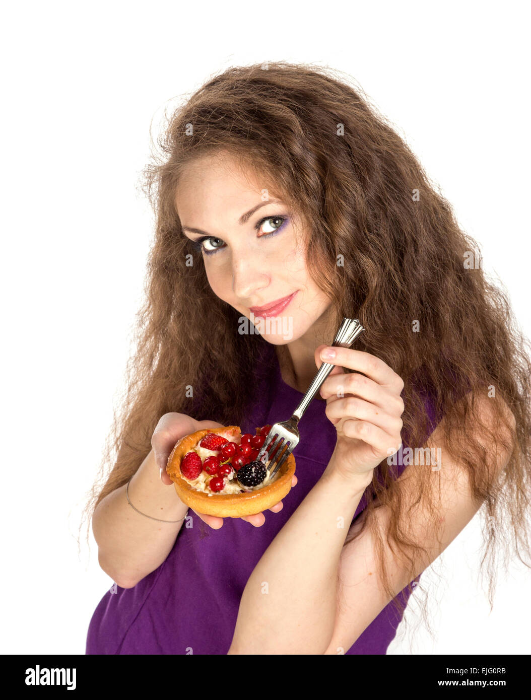 Woman enjoy cake, isolated Stock Photo - Alamy